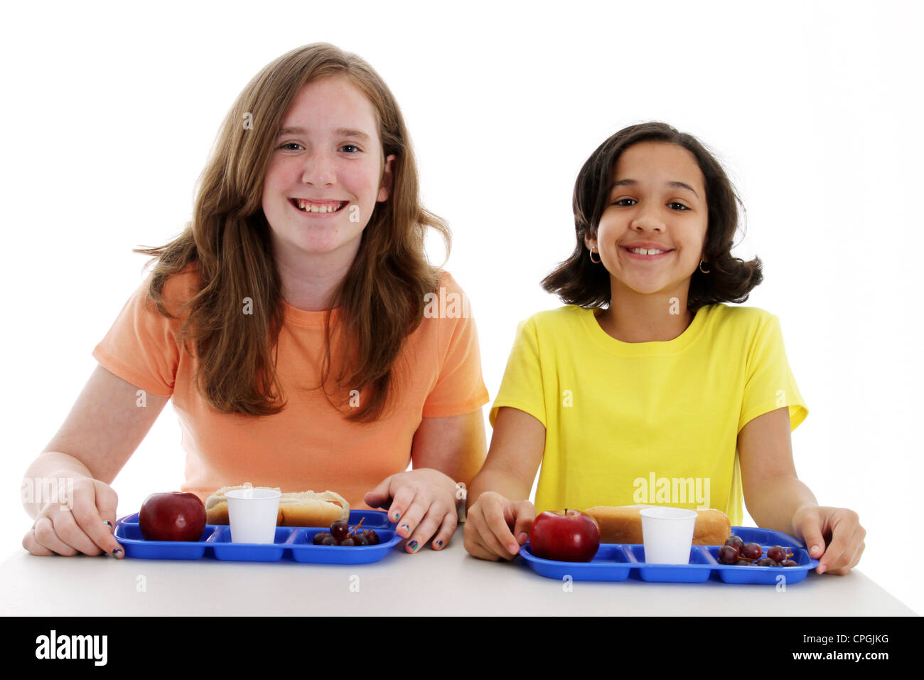 Kids eating their lunch together at school Stock Photo - Alamy