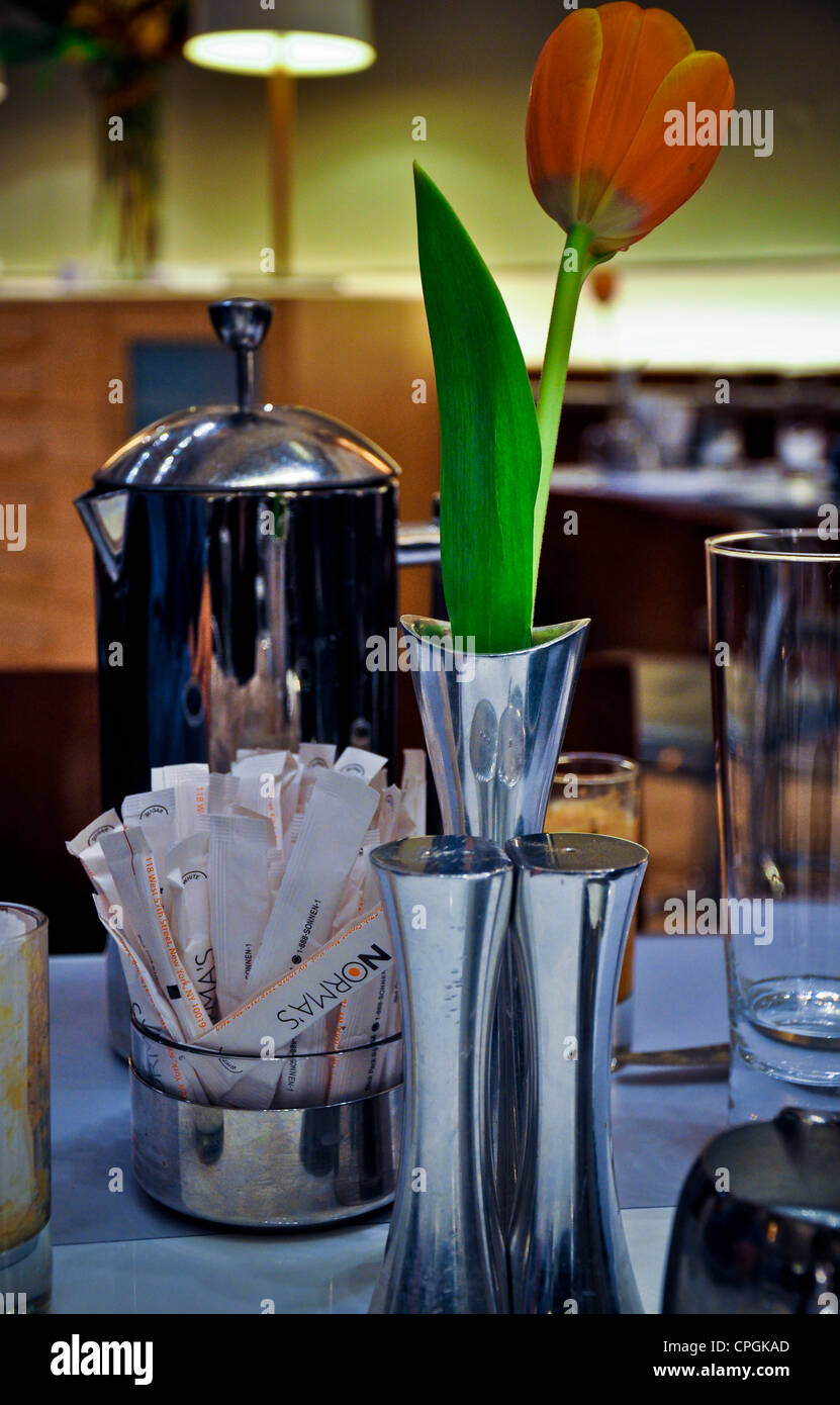 Red tulip on table Stock Photo - Alamy