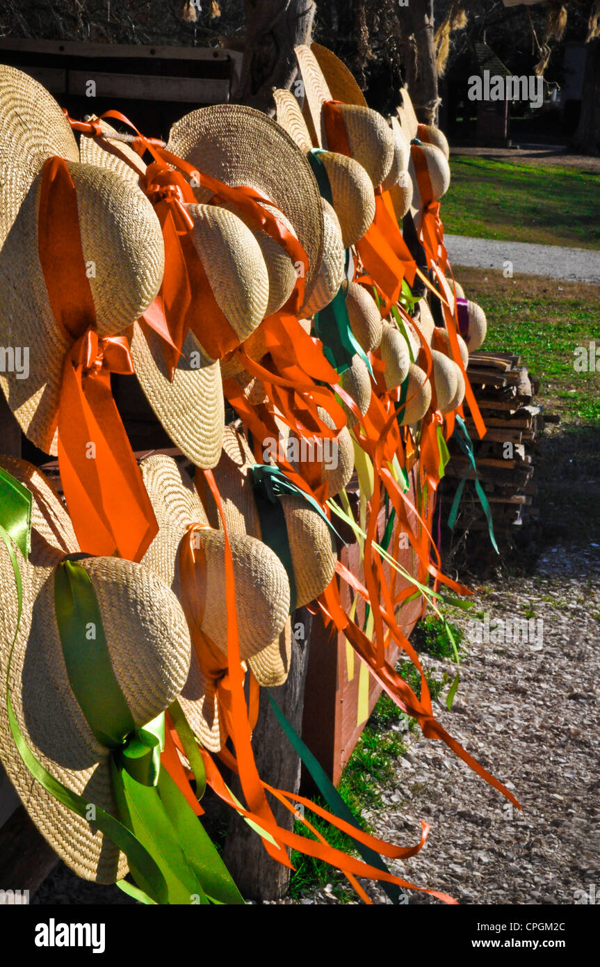 assorted straw hats display for sale Stock Photo - Alamy