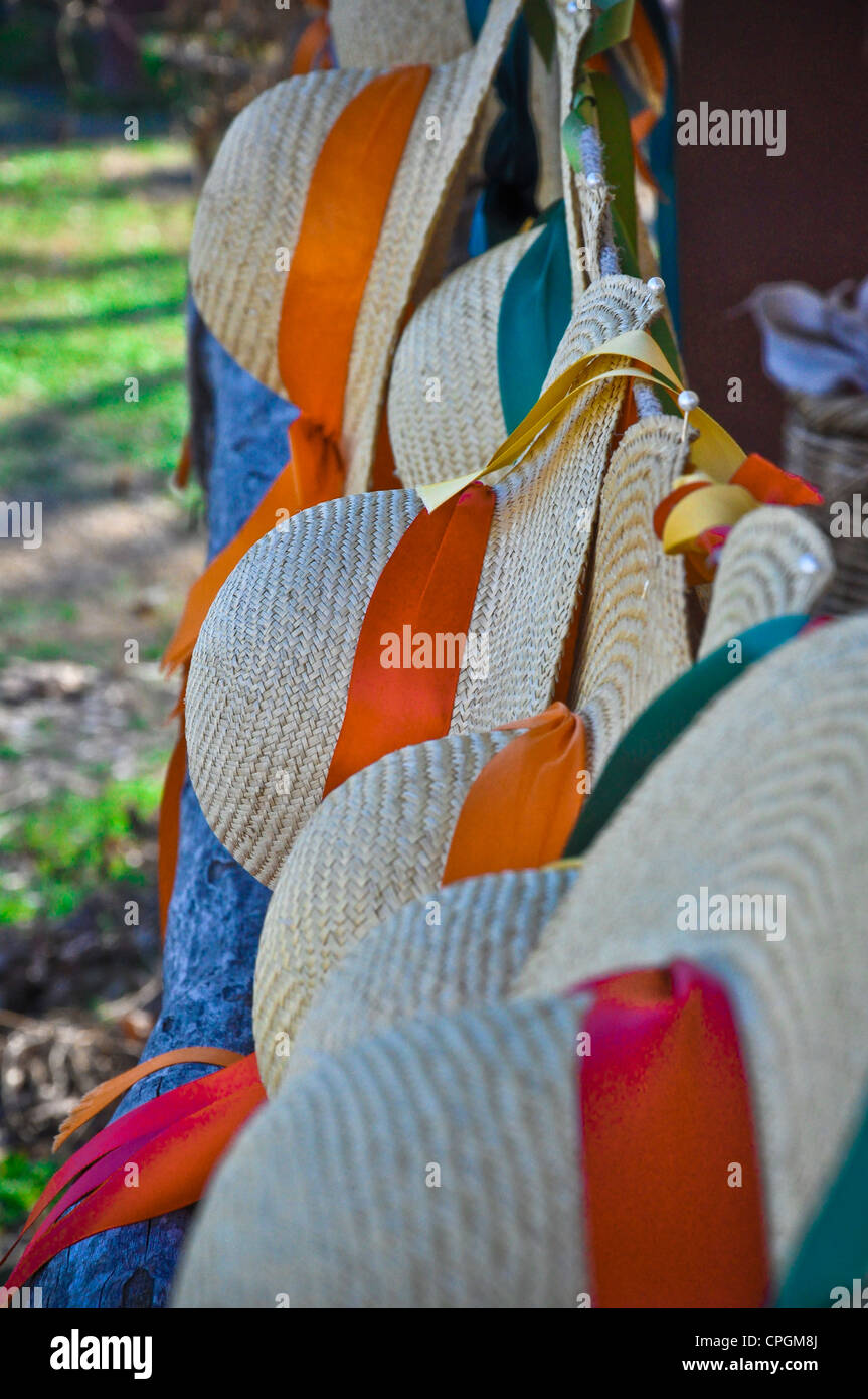 assorted straw hats display for sale Stock Photo - Alamy