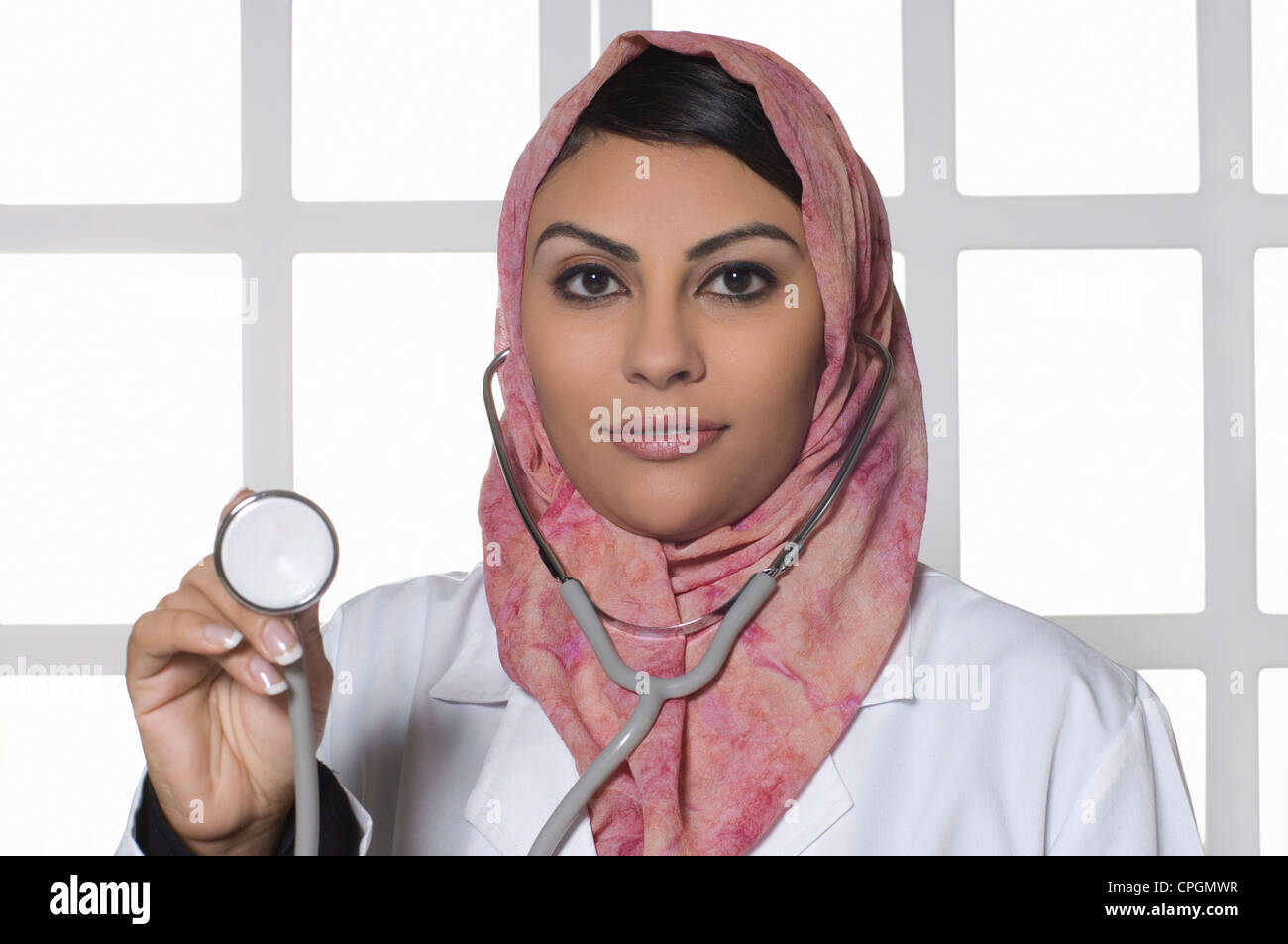 Female doctor wearing stethoscope, portrait Stock Photo - Alamy