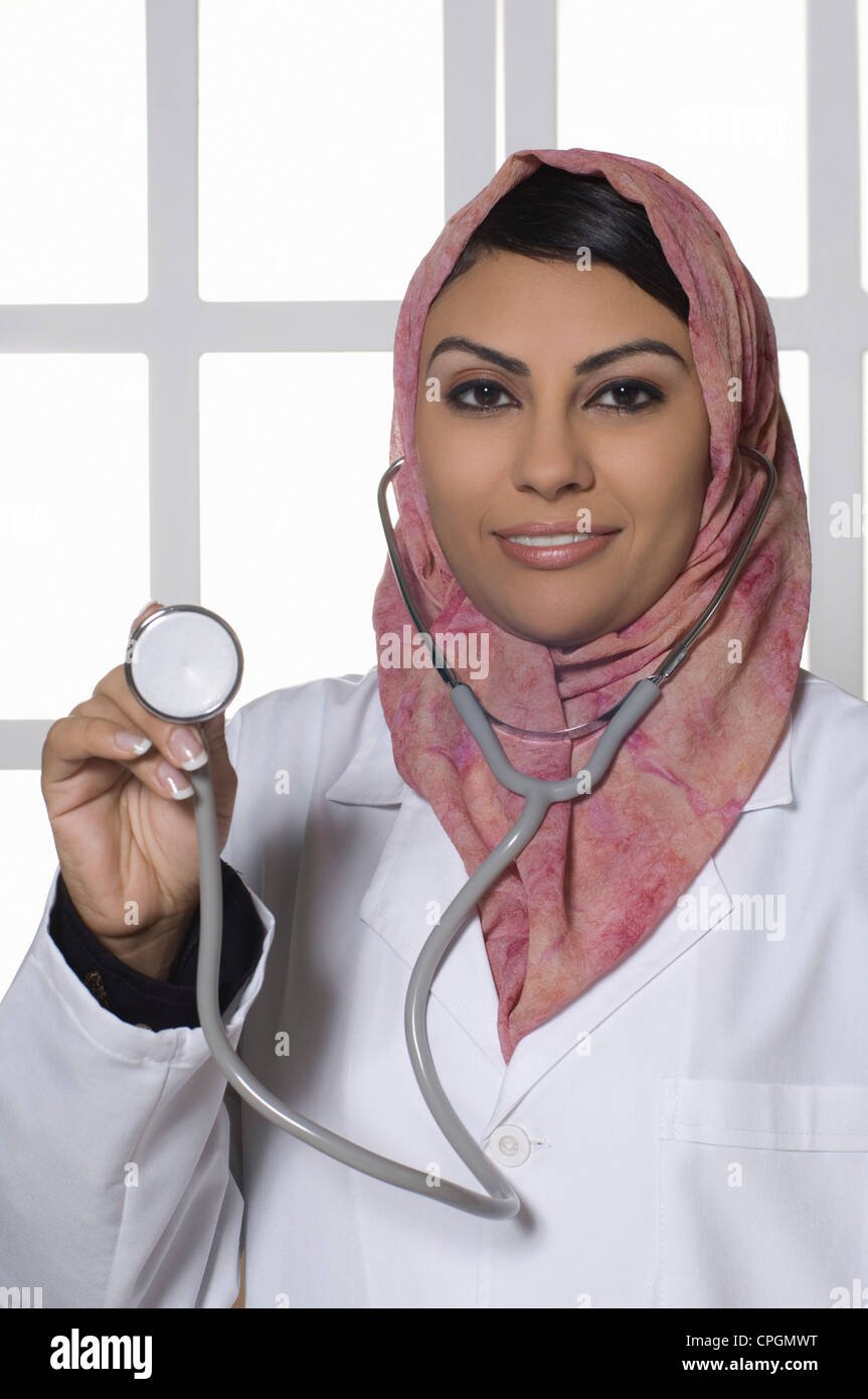 Female doctor wearing stethoscope, portrait Stock Photo - Alamy