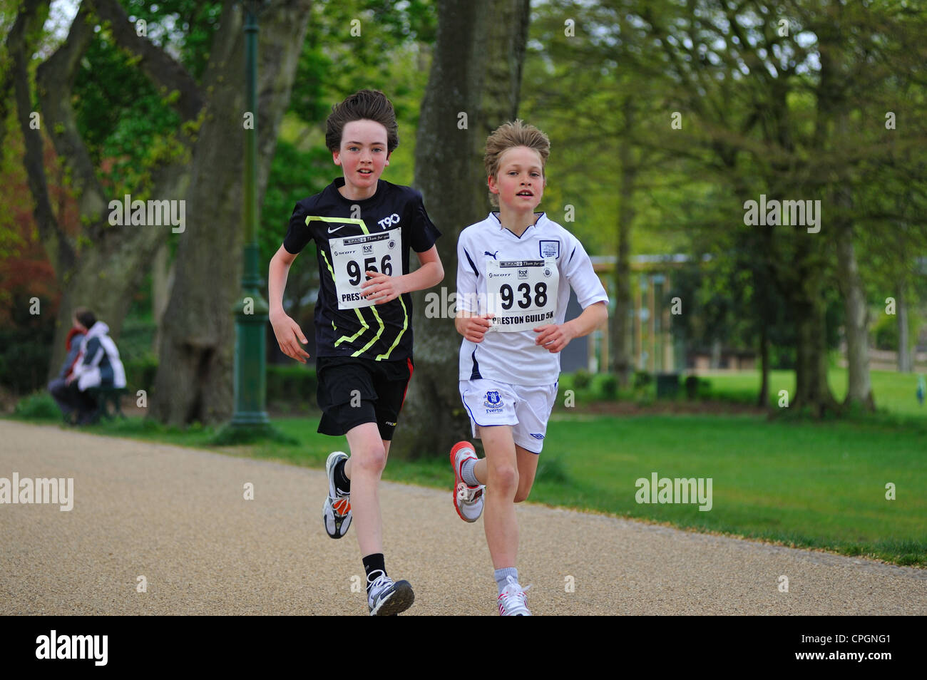 young runners competing in a running race Stock Photo - Alamy