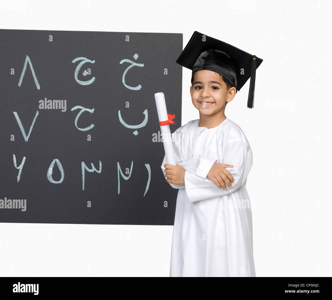 Boy kindergarten graduation mortarboard hi-res stock photography and ...