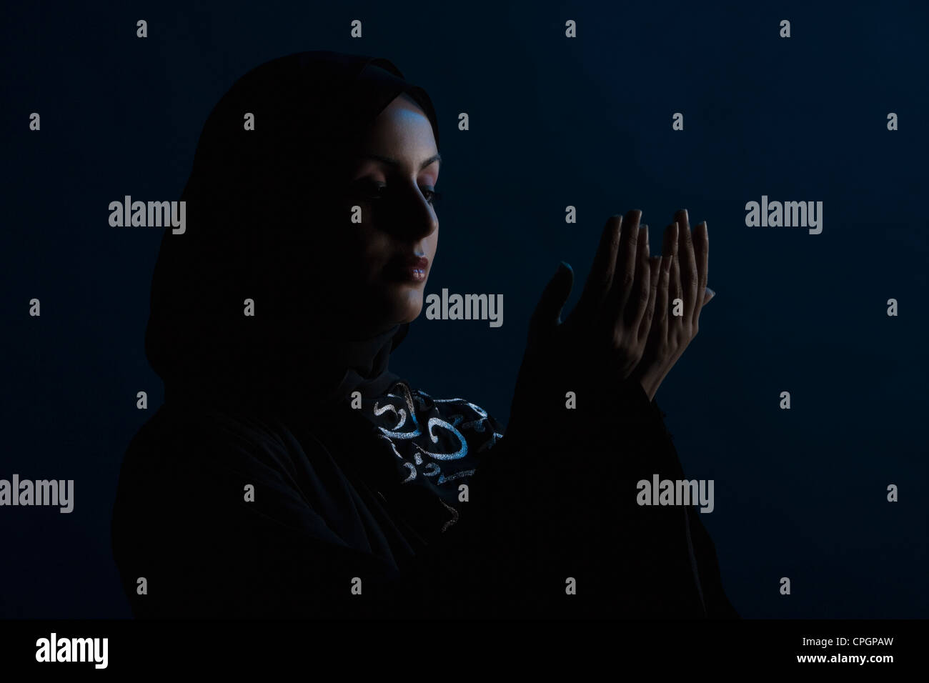 Praying hands over head hi-res stock photography and images - Alamy