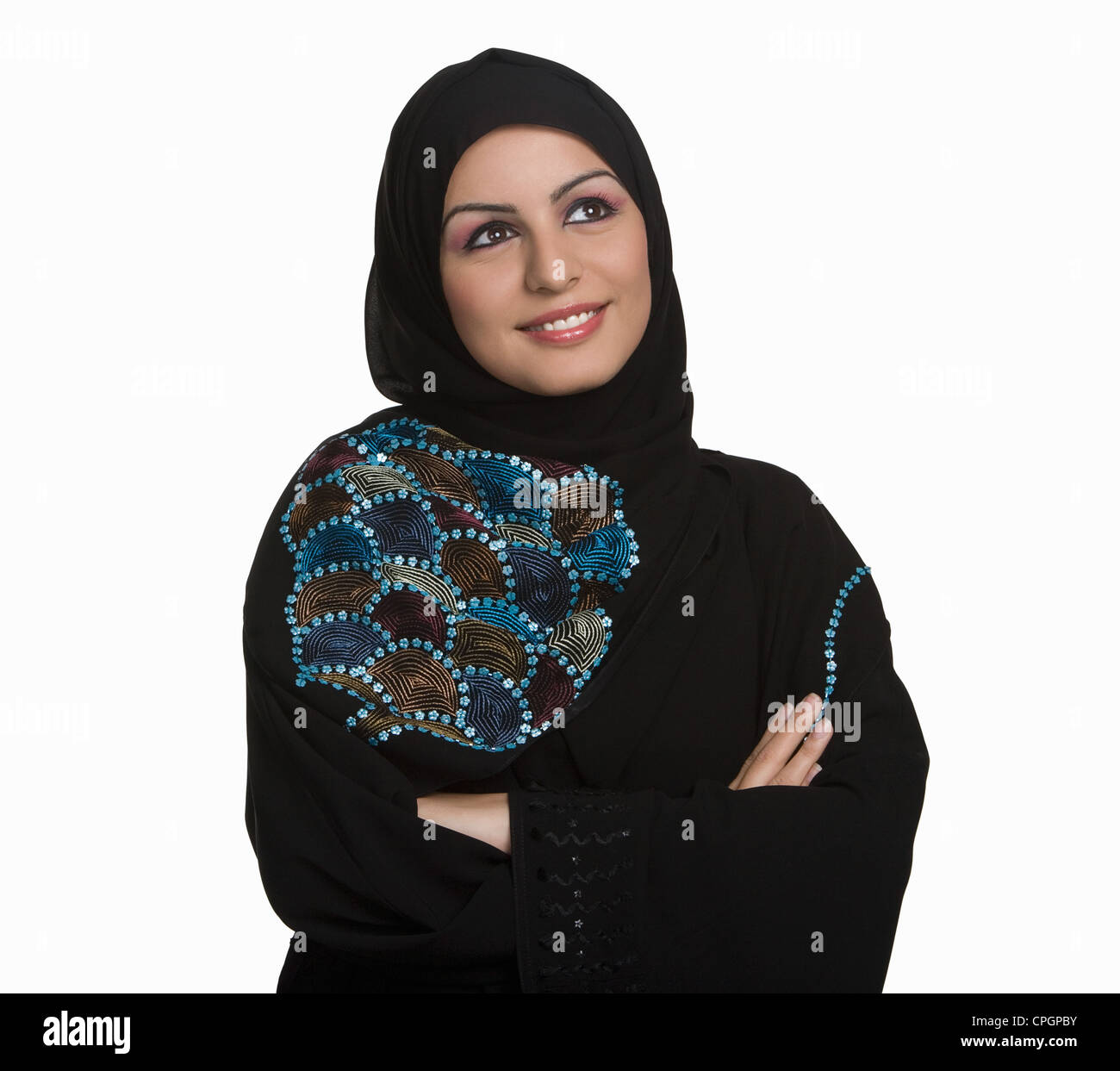 Smiling young woman arms crossed hi-res stock photography and images ...