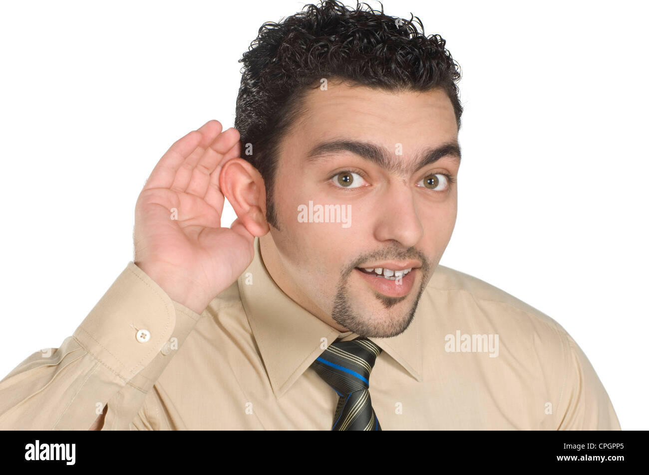 Young man with hands covering ears, portrait Stock Photo - Alamy