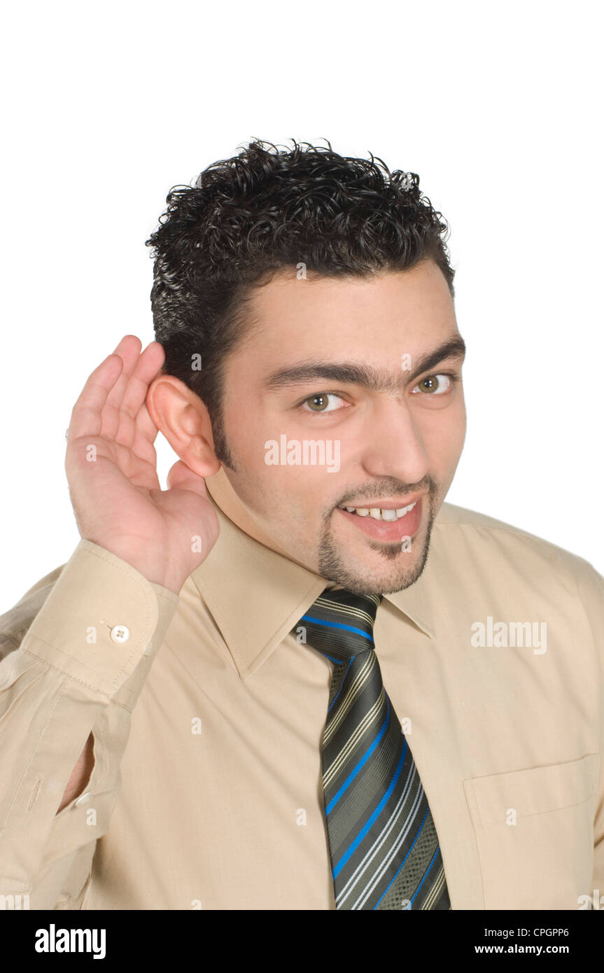 Young man with hands covering ears, portrait Stock Photo - Alamy