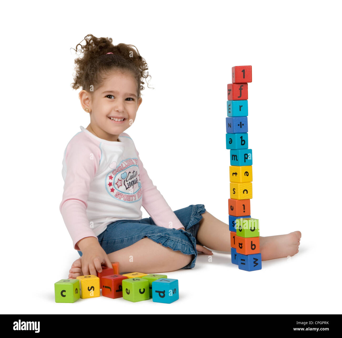 Child playing with letter blocks Cut Out Stock Images & Pictures - Alamy