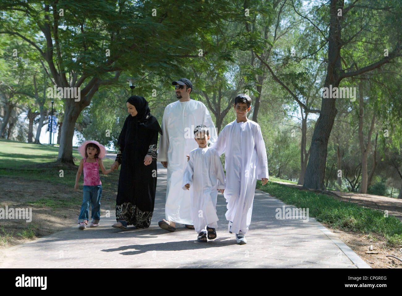Arab father son walking in hi-res stock photography and images - Alamy