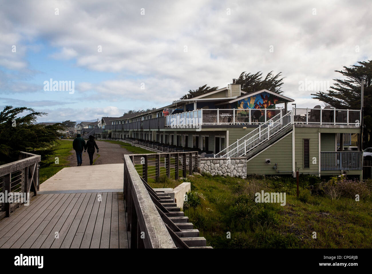 A couple walking on the Ten Mile Trail in Fort Bragg California in ...