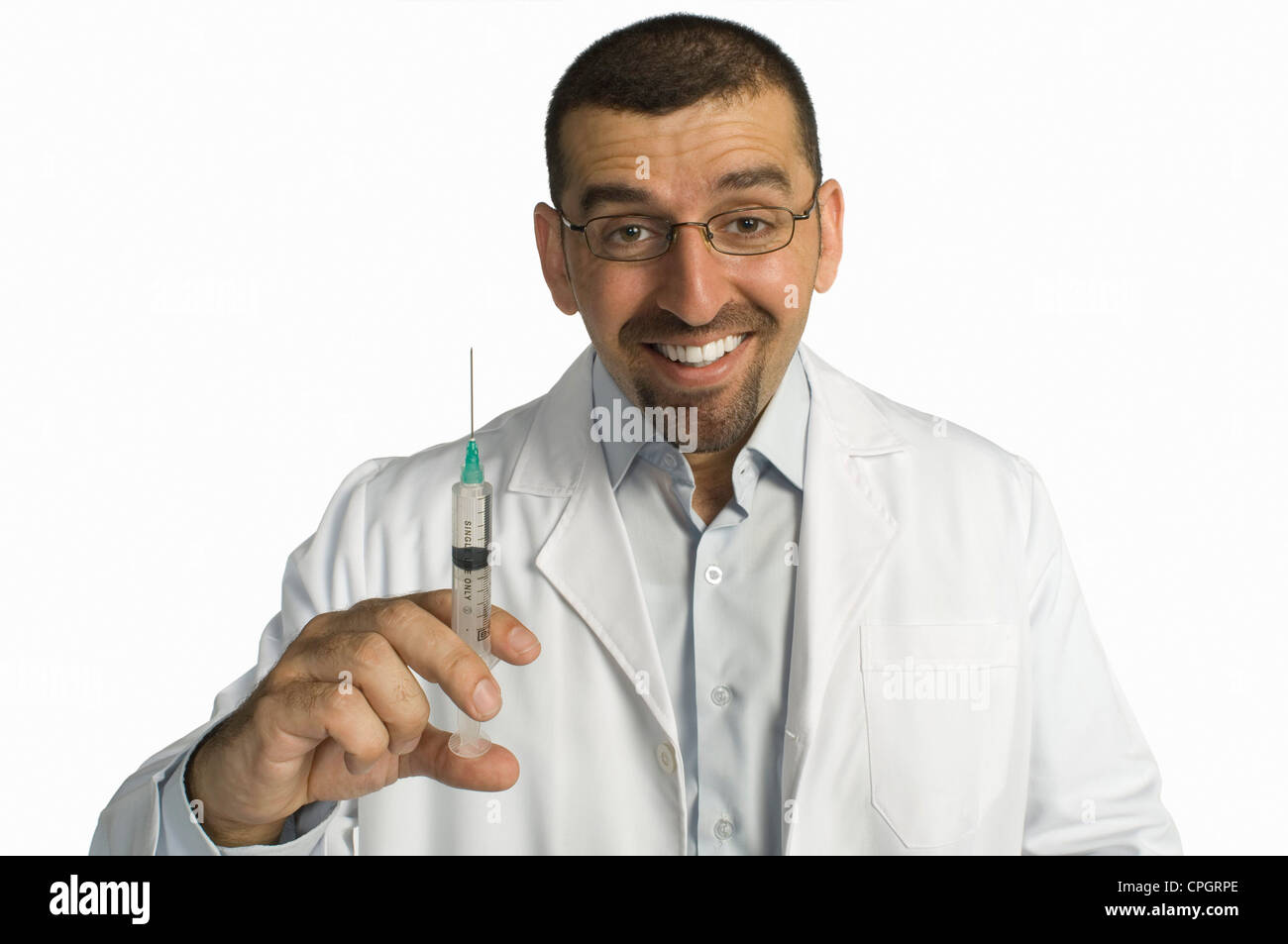 Doctor holding syringe, smiling, portrait Stock Photo - Alamy