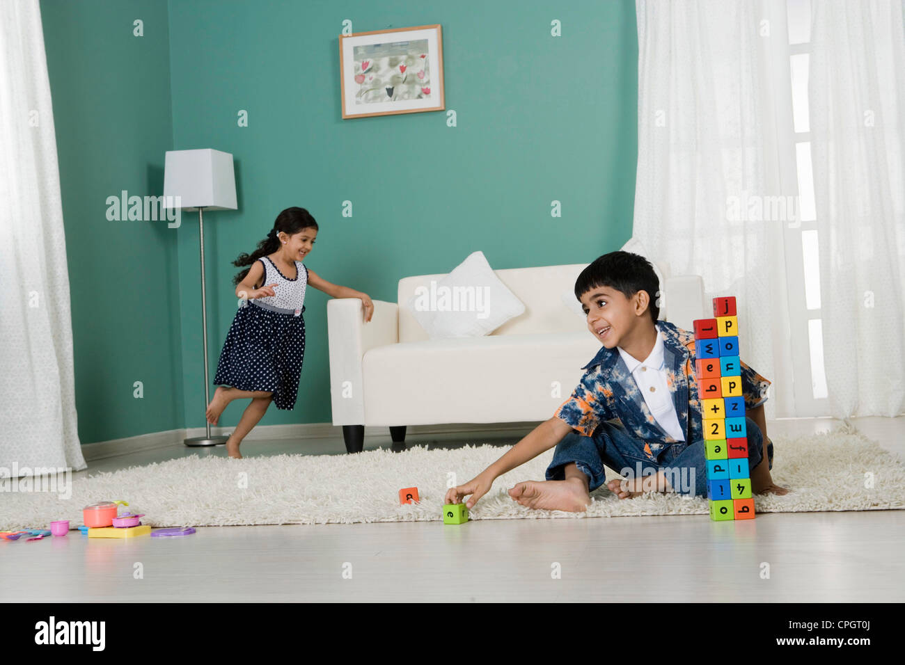 Children playing at home Stock Photo - Alamy