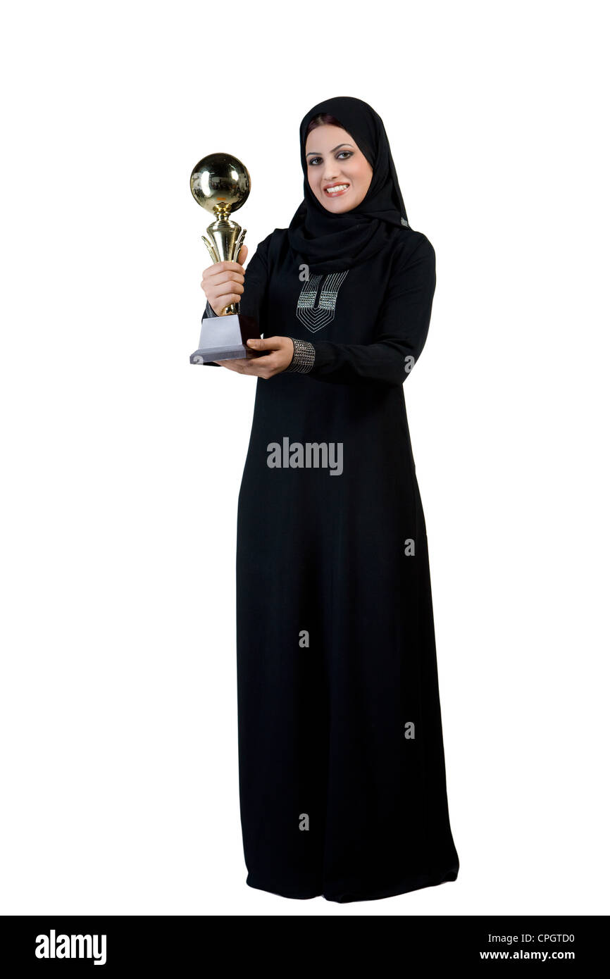 Arab woman holding a trophy Stock Photo - Alamy