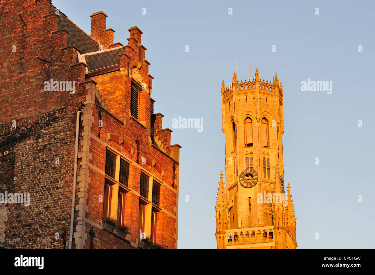 Belfry tower at sunset, Bruges, Belgium Stock Photo - Alamy
