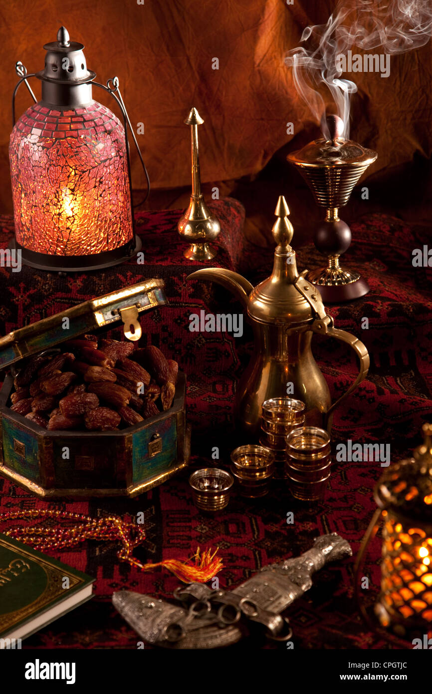 Dates and tea set with Ramadan ornaments Stock Photo - Alamy