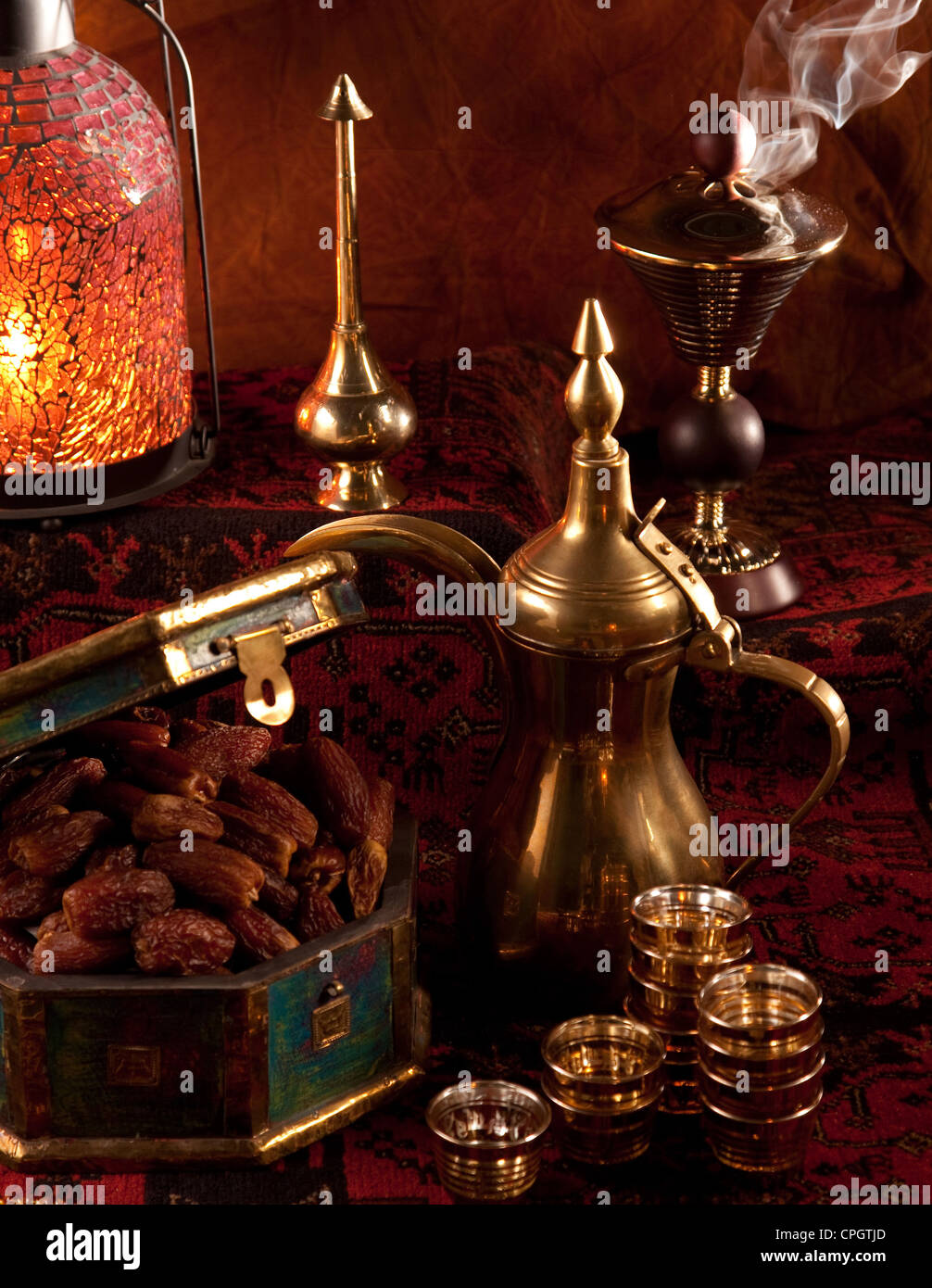 Dates and tea set with Ramadan ornaments Stock Photo - Alamy
