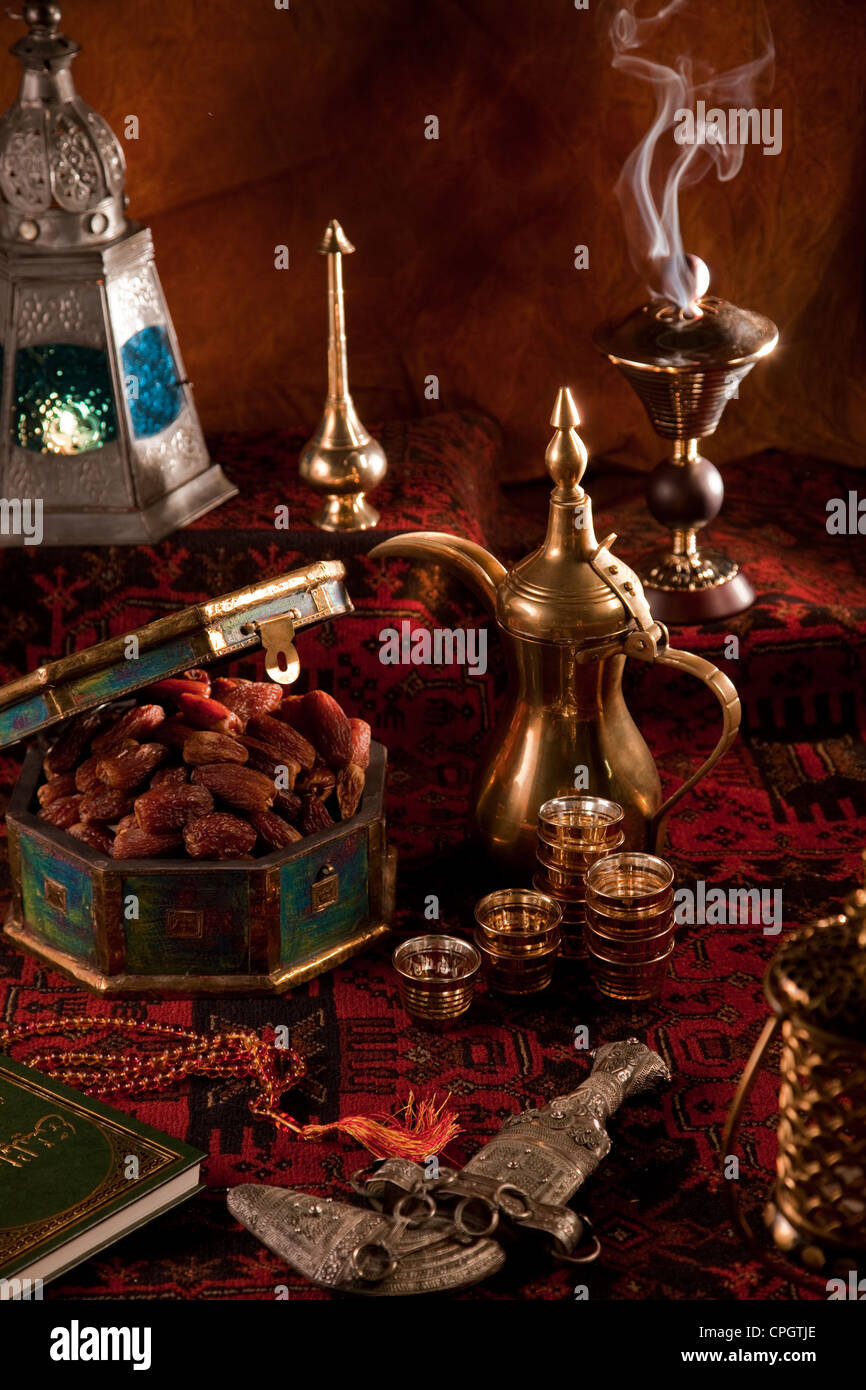 Dates and tea set with Ramadan ornaments Stock Photo - Alamy
