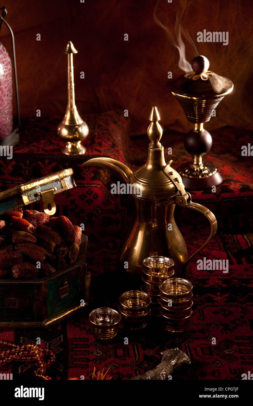 Dates and tea set with Ramadan ornaments Stock Photo - Alamy