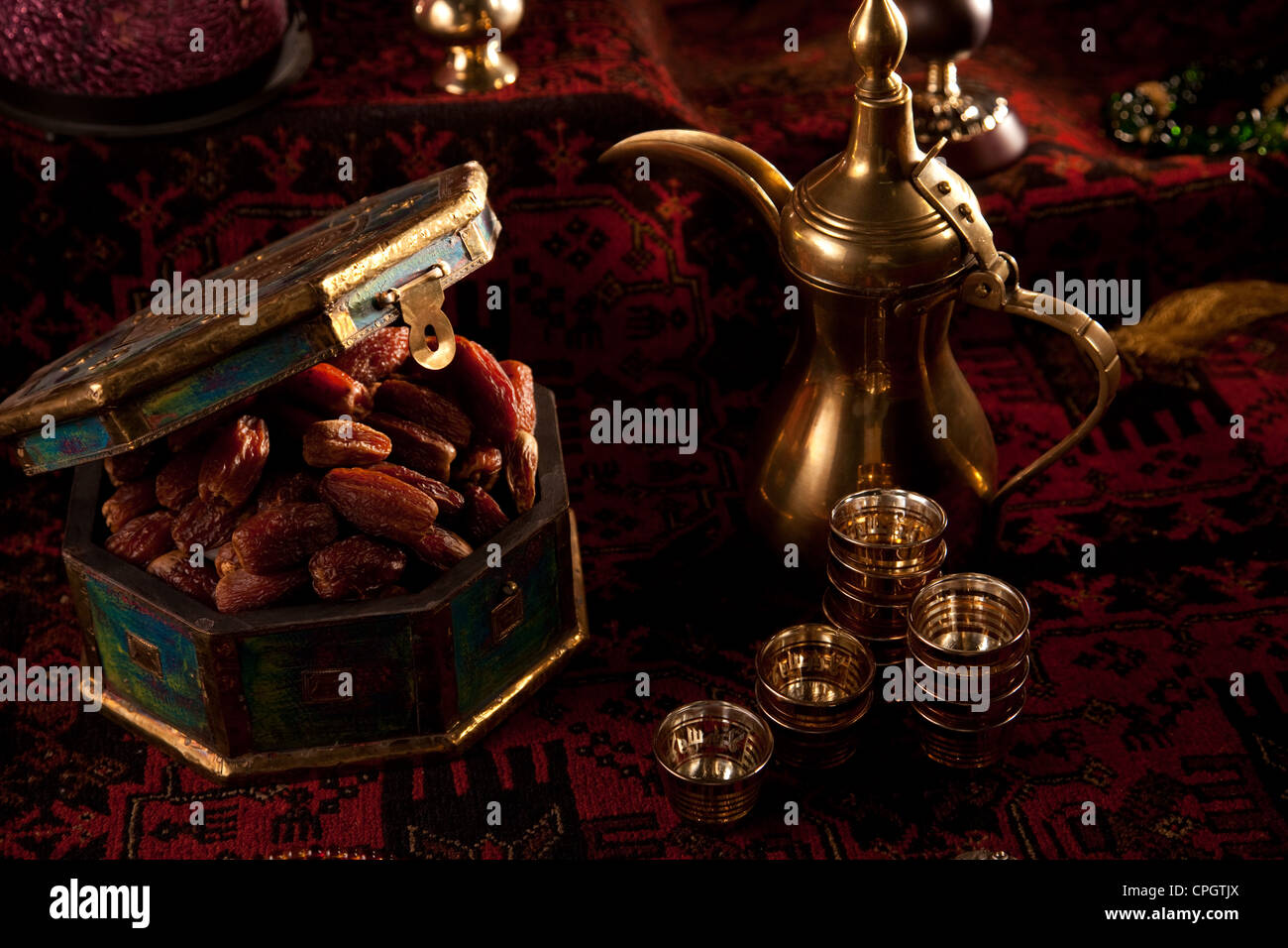 Dates and tea set with Ramadan ornaments Stock Photo - Alamy