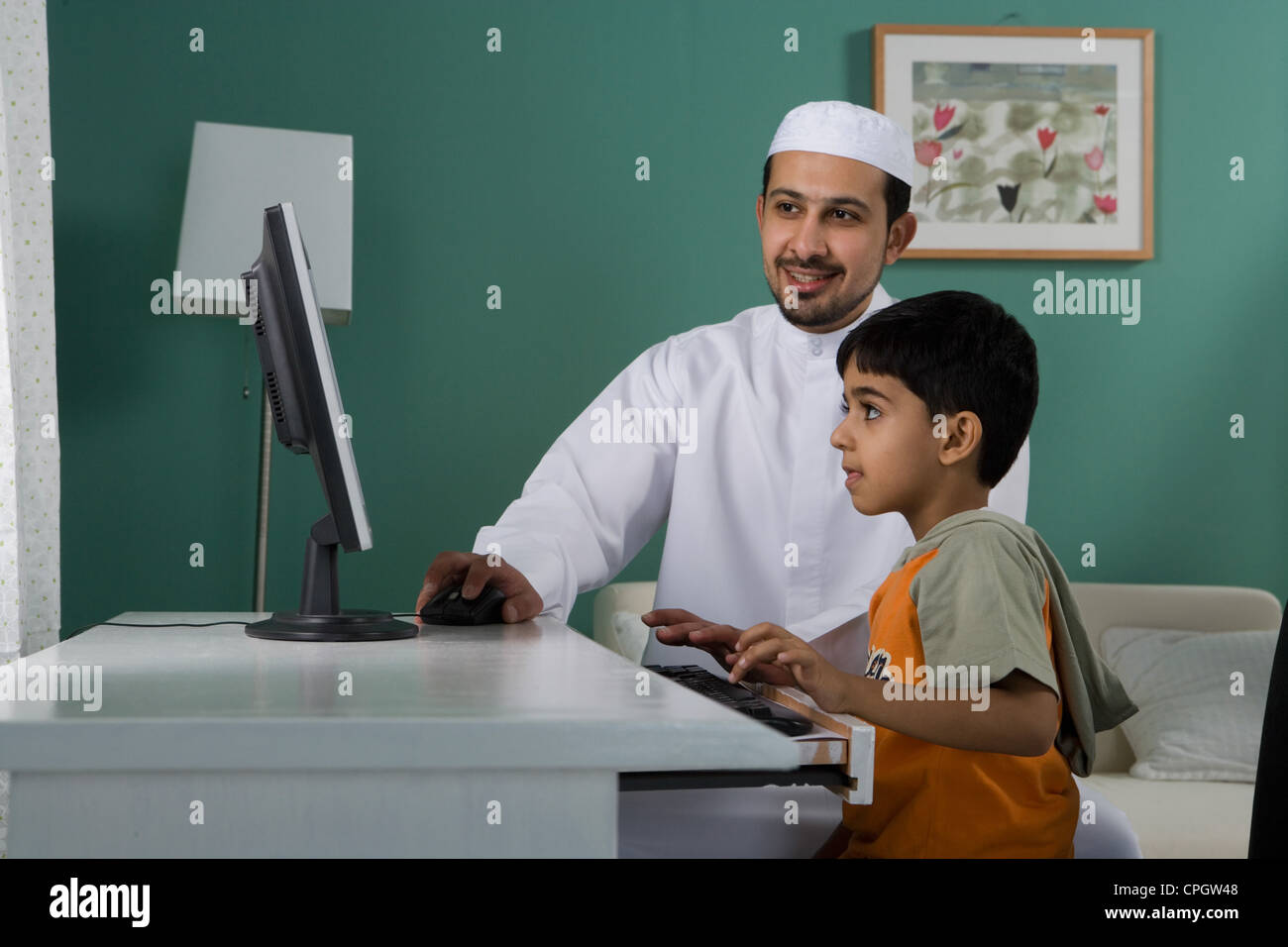 Arab boy and computer hi-res stock photography and images - Alamy