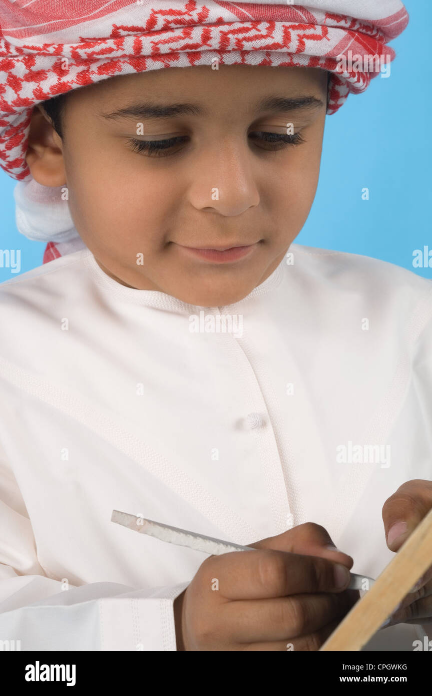 Arab boy writing hi-res stock photography and images - Alamy