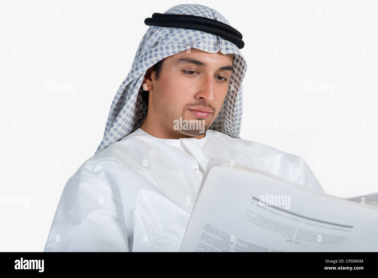 Emirati man reading hi-res stock photography and images - Alamy