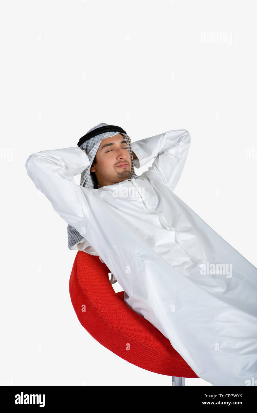Young man sleeping on chair Stock Photo - Alamy