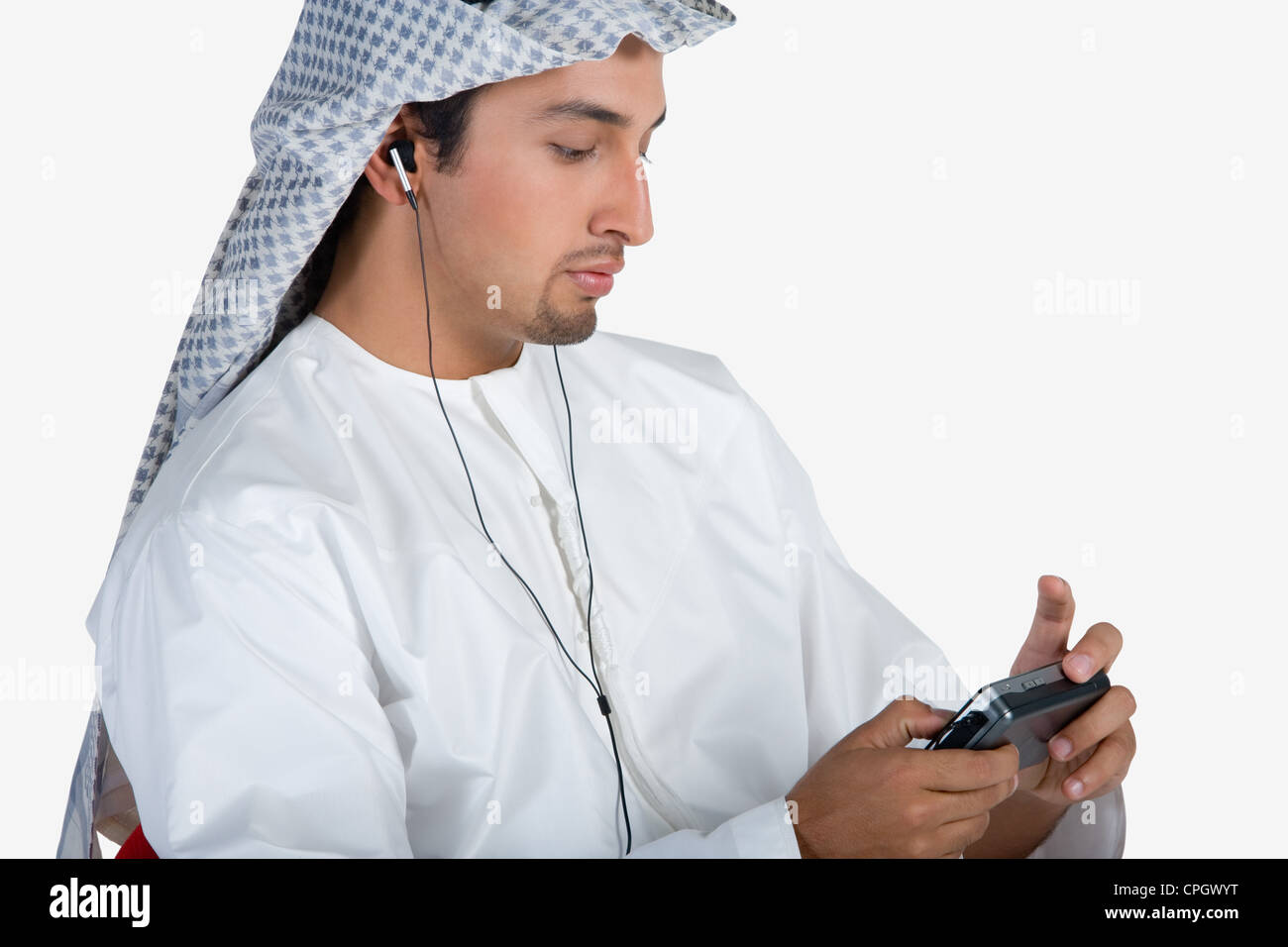 Young man holding walkman, listening to music Stock Photo - Alamy