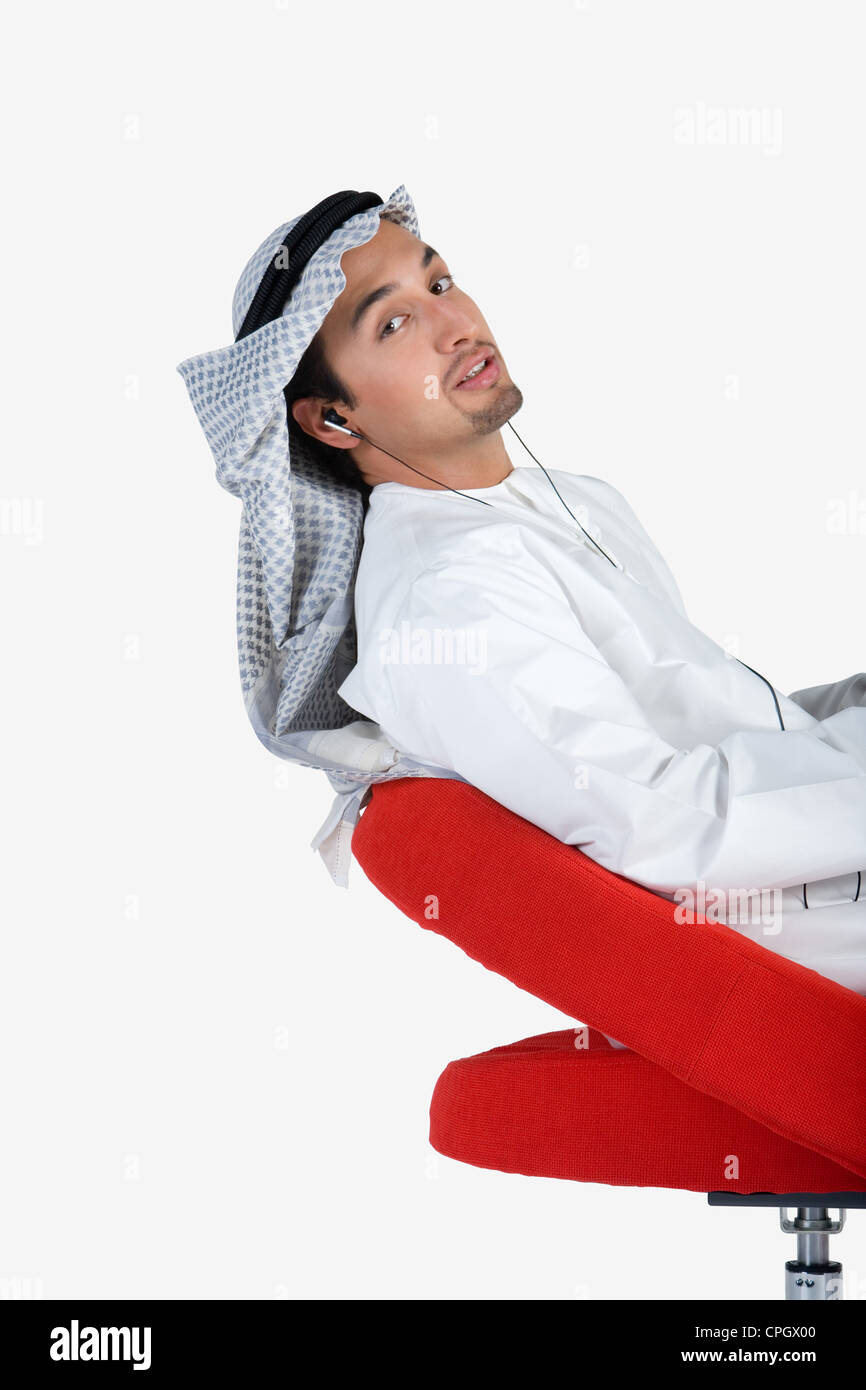 Young man listening to music, portrait Stock Photo - Alamy