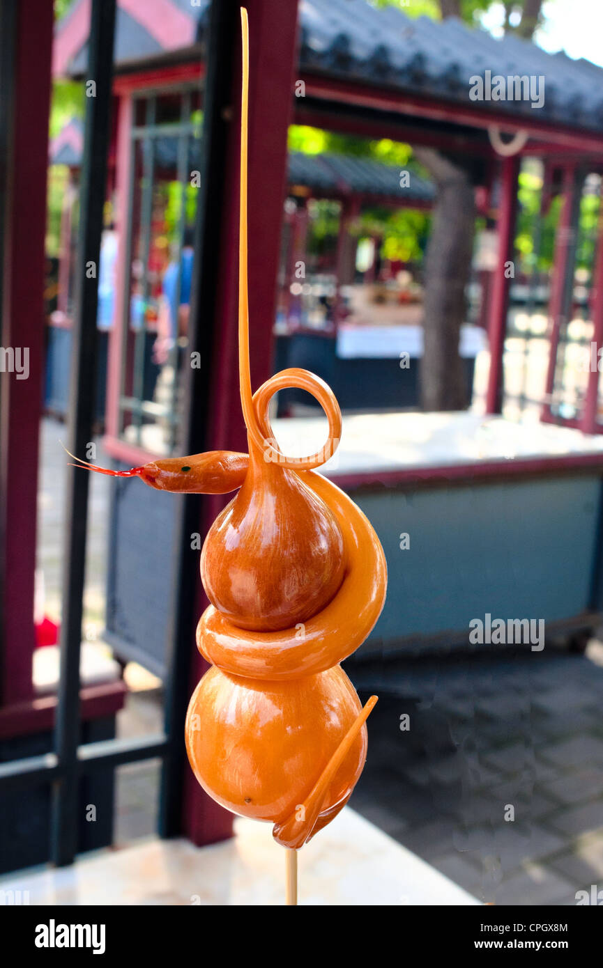 Snack made by sugar, one of the Chinese folk handicrafts Stock Photo ...