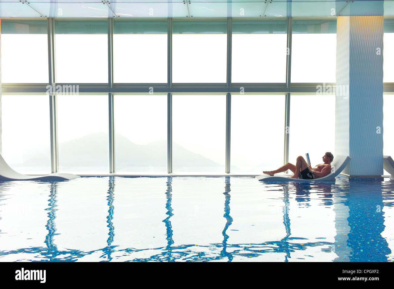 A man relaxes and swims at the world's highest swimming pool Stock ...