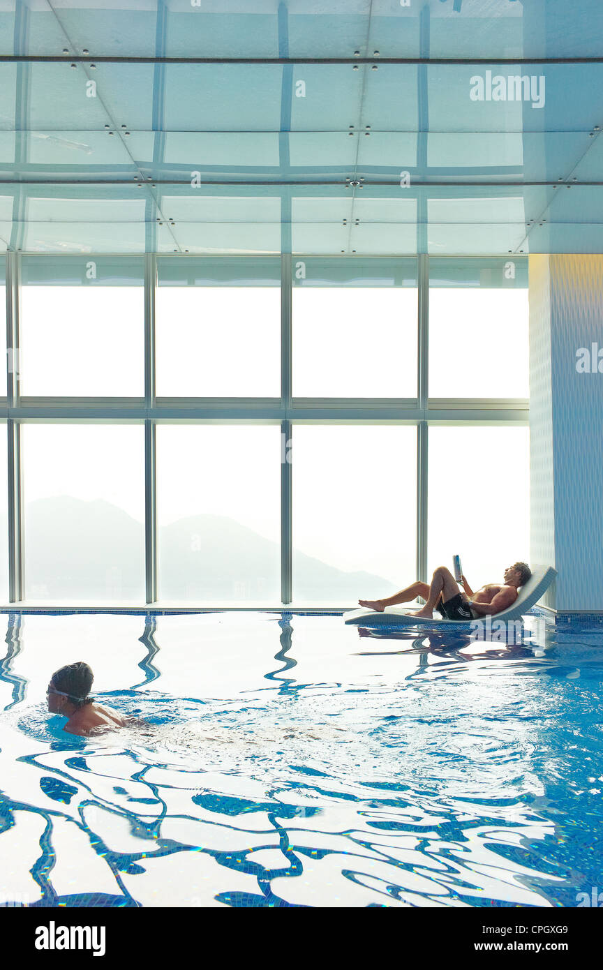 A man relaxes and swims at the world's highest swimming pool Stock ...