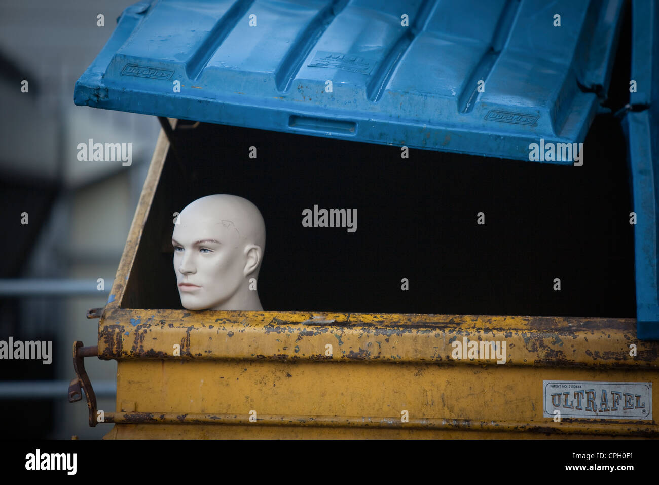 A Mannequins head popping out of a industrial refuge bin in Manchester ...