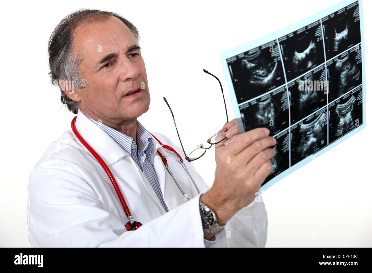 Doctor examining a scan Stock Photo - Alamy