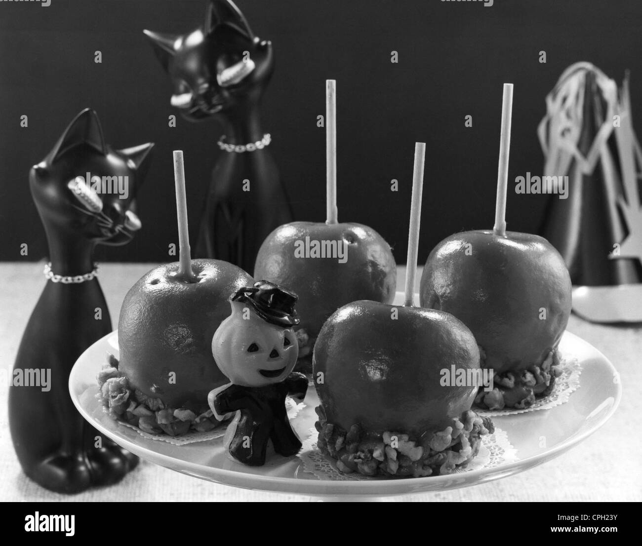 food, fruit, plate with caramelised apple on the stick, 1950s ...