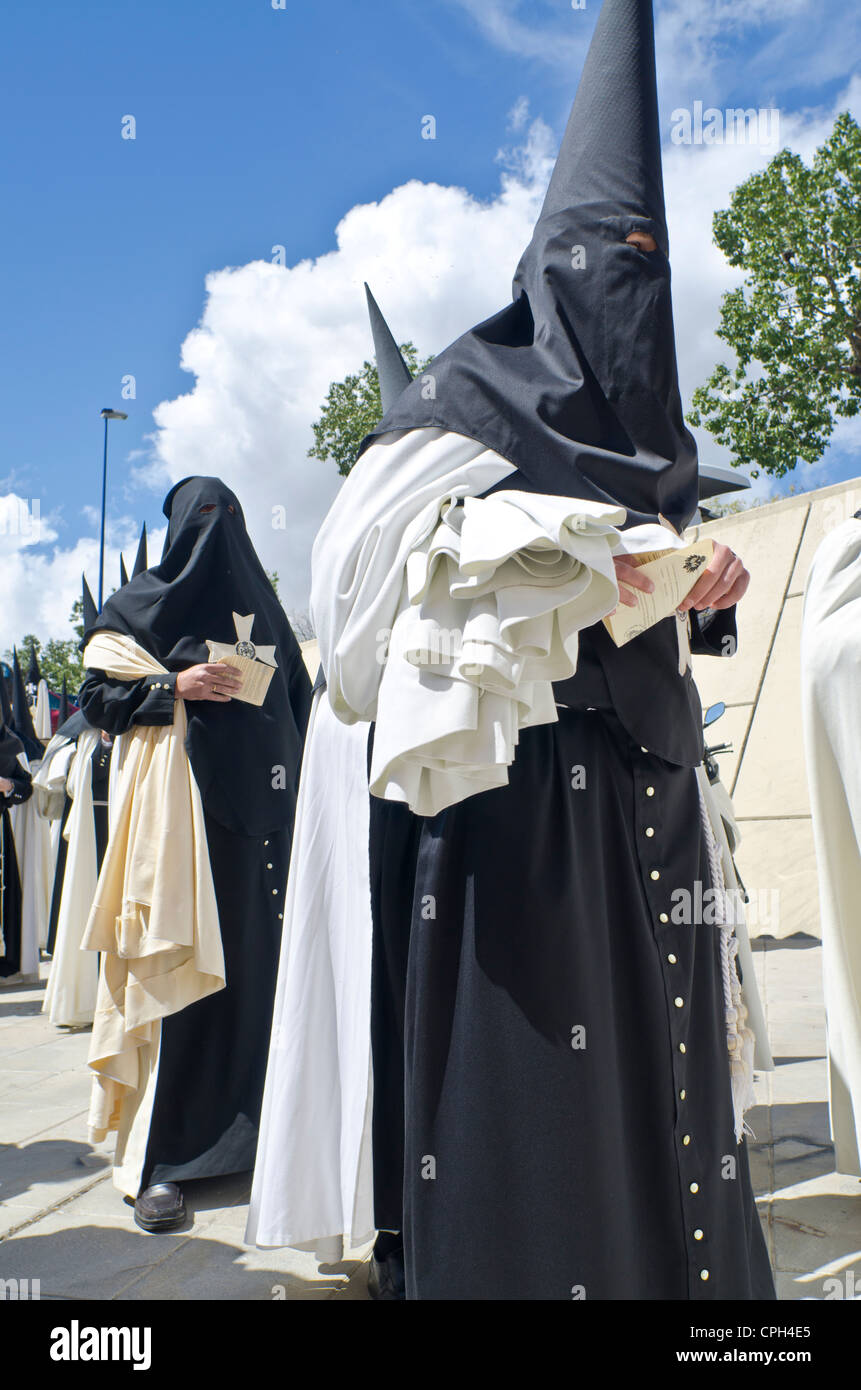 Brotherhood during holy week in seville hi-res stock photography and ...
