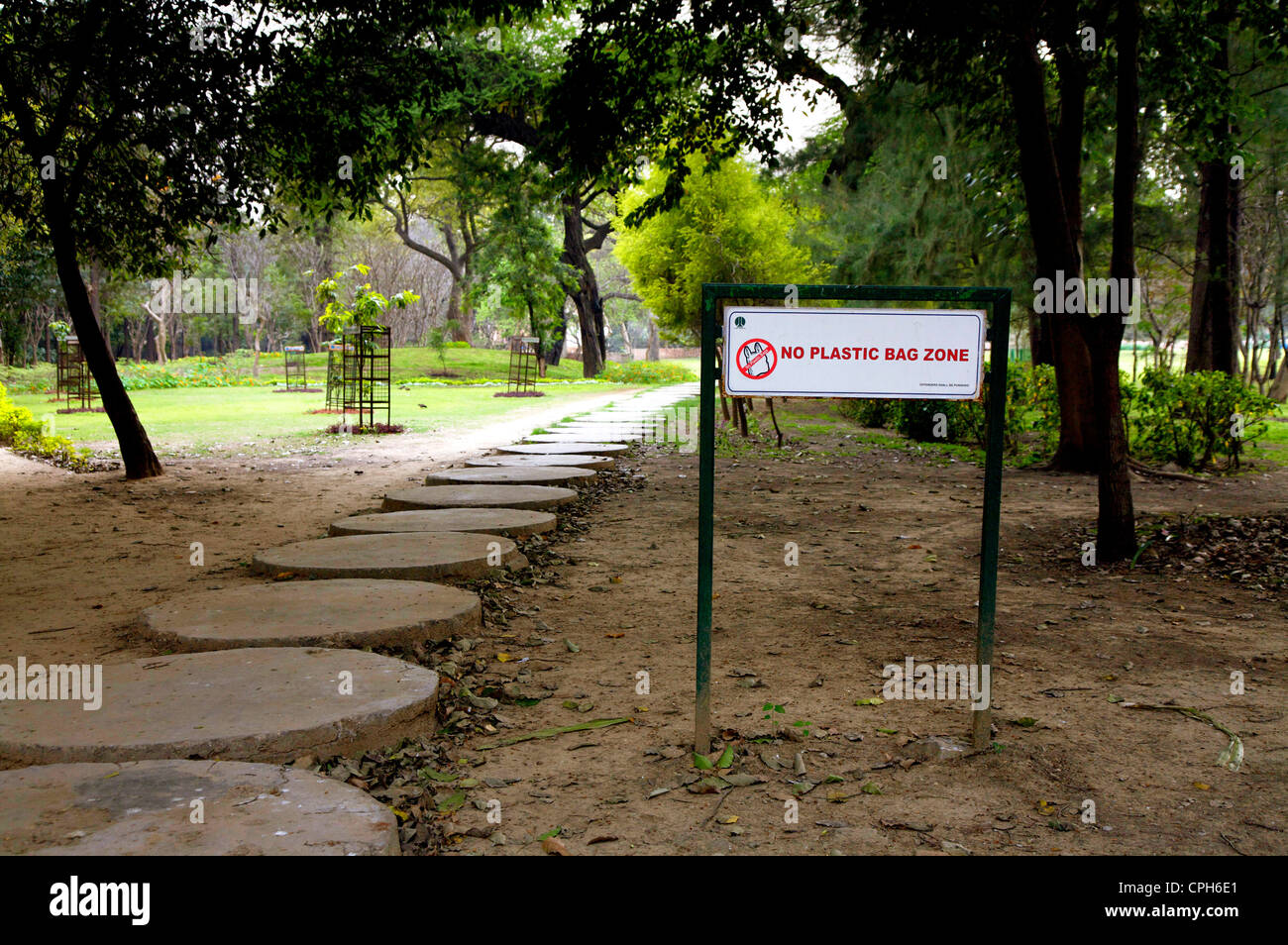 Notice in a park Stock Photo - Alamy