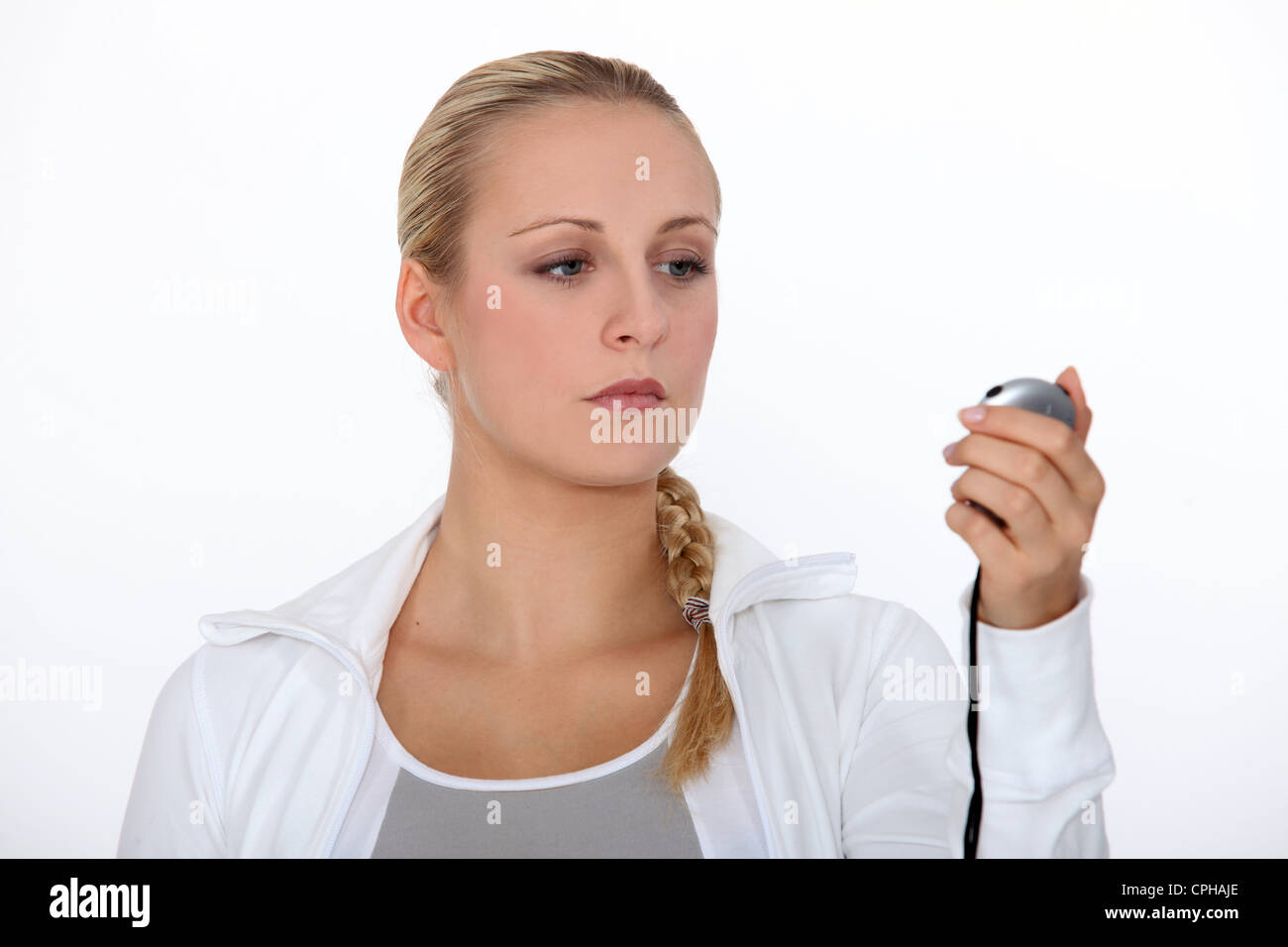 Woman with a stopwatch Stock Photo - Alamy