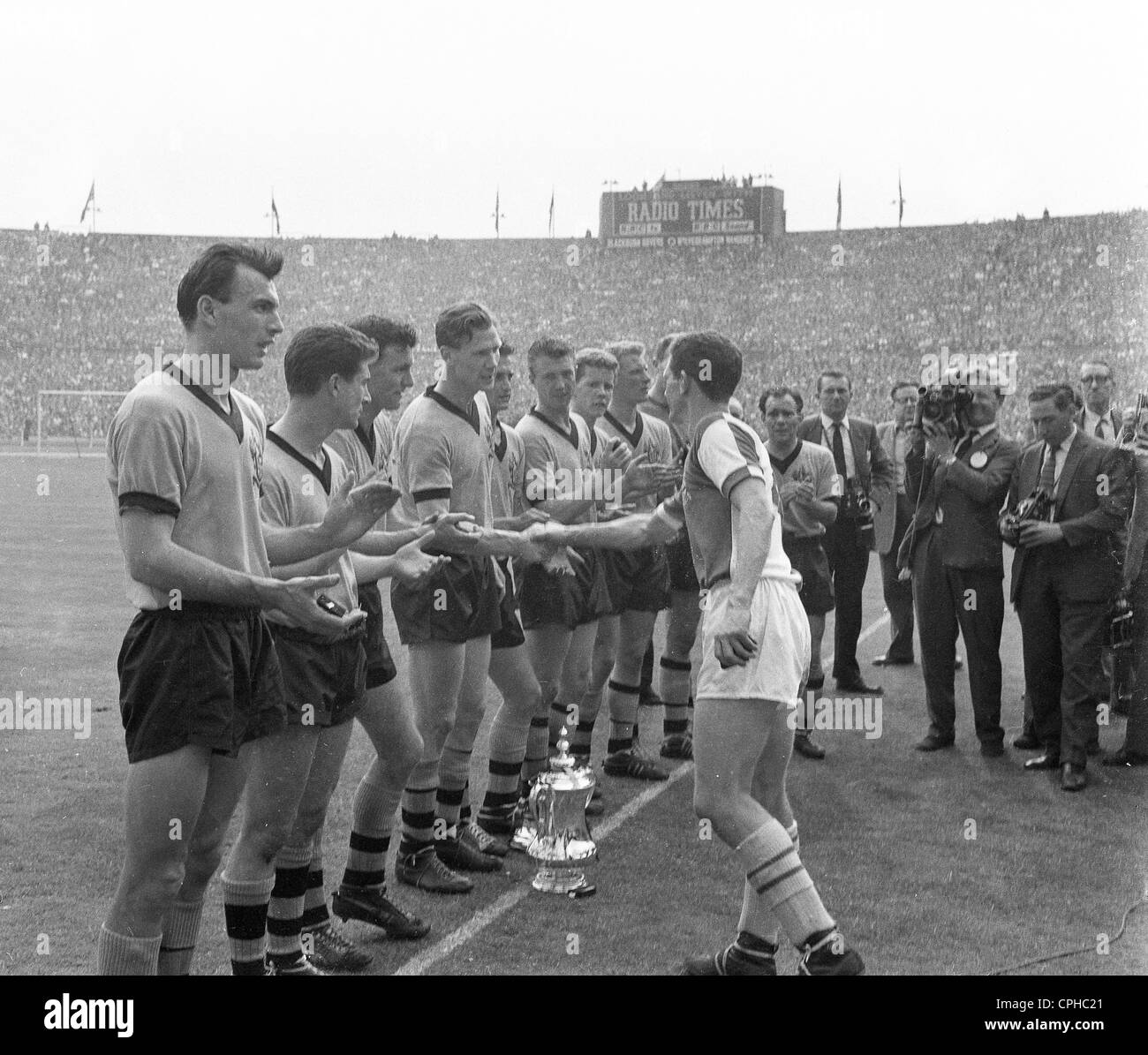 Blackburn Rovers captain Ronnie Clayton congratulates the 1960 FA Cup ...