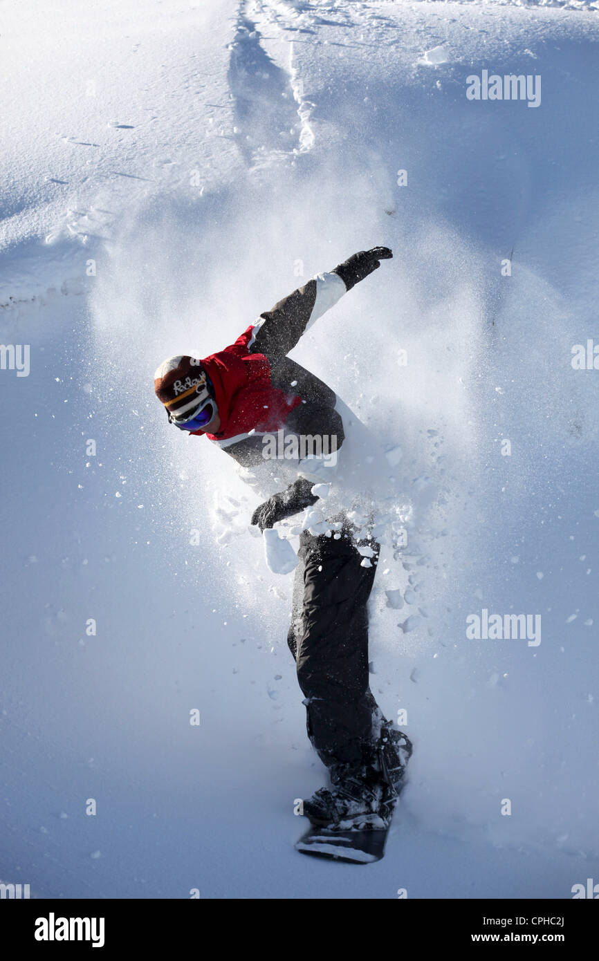 Snowboarder in action Stock Photo - Alamy