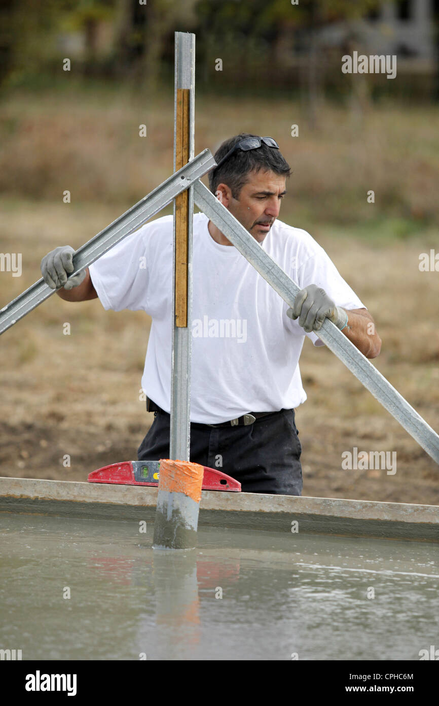 Man preparing building foundations Stock Photo - Alamy