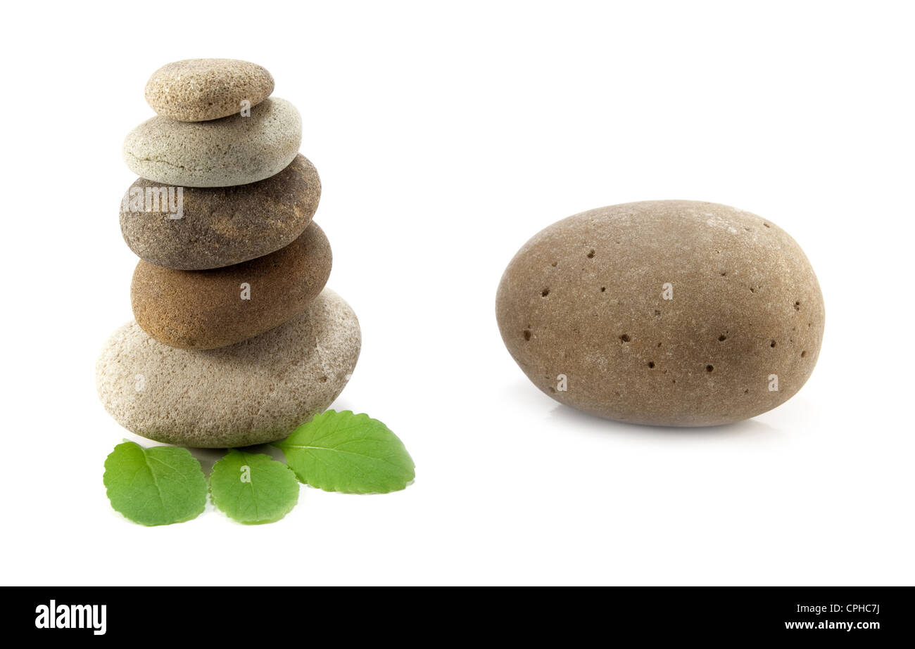 stack of pebbles and leaf on white background Stock Photo - Alamy