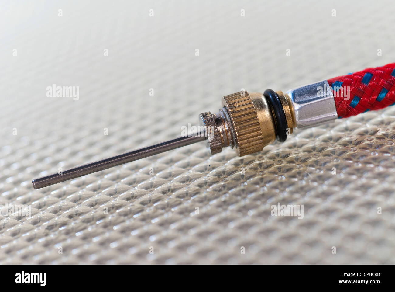 Football Needle Valve on Pump Stock Photo - Alamy