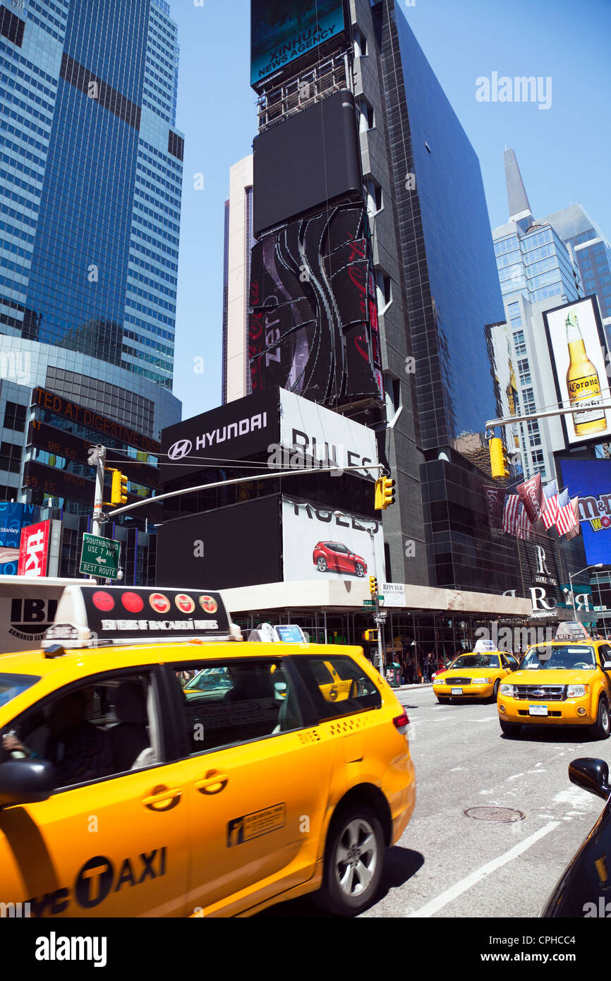 The iconic yellow taxi in Times Square, New York city USA. Times square ...