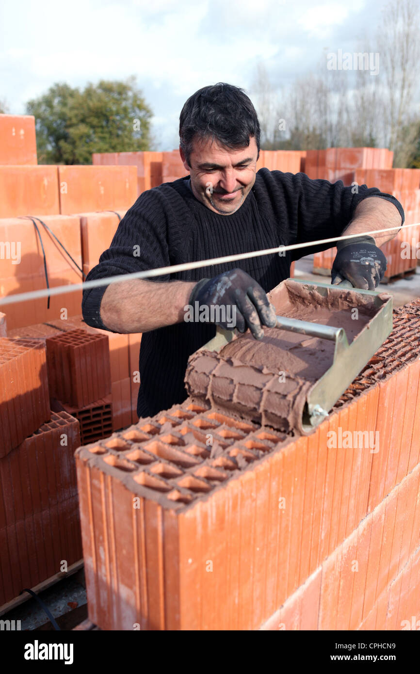 Portrait of a bricklayer Stock Photo - Alamy