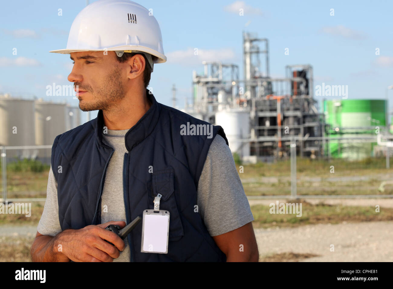 Employee on a building site Stock Photo - Alamy
