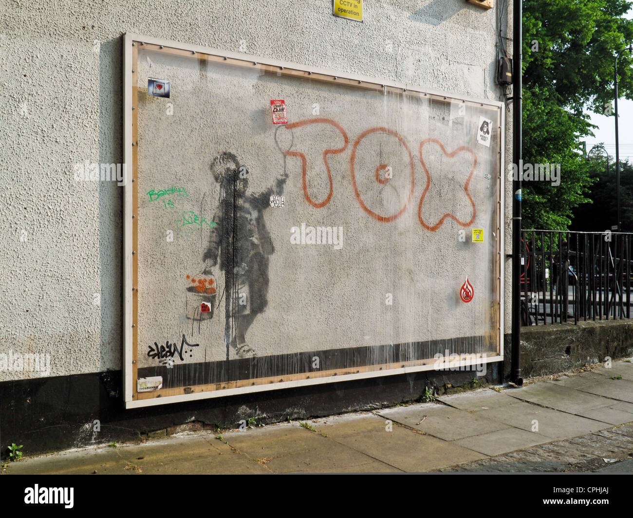 Banksy Tox graffiti covered in perspex screen. Jeffreys Street, Camden ...