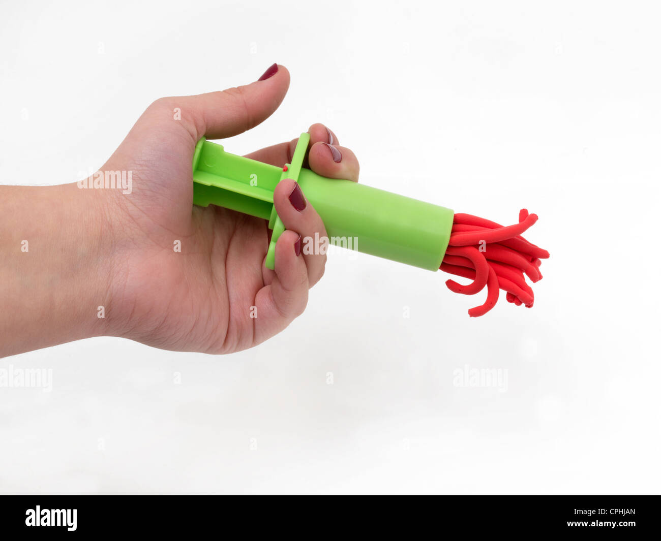 Shaping Modelling Clay Using an extruder Stock Photo - Alamy