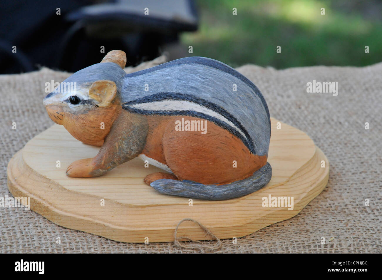 Chipmunk carved out of a block of wood Stock Photo - Alamy